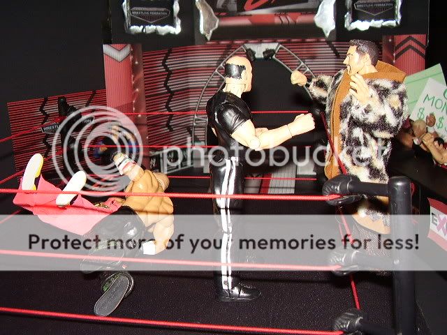 Bucci: Hold on a second! Rob's up on the ring apron. Come on Rob, let ...